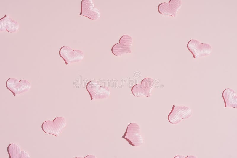 Background Pattern Pink Heart on Peach Colored Paper Stock Photo ...