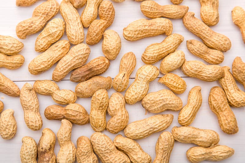 Background from Peanuts Nuts. Peanuts in Shells and Clean Kernels. Top ...