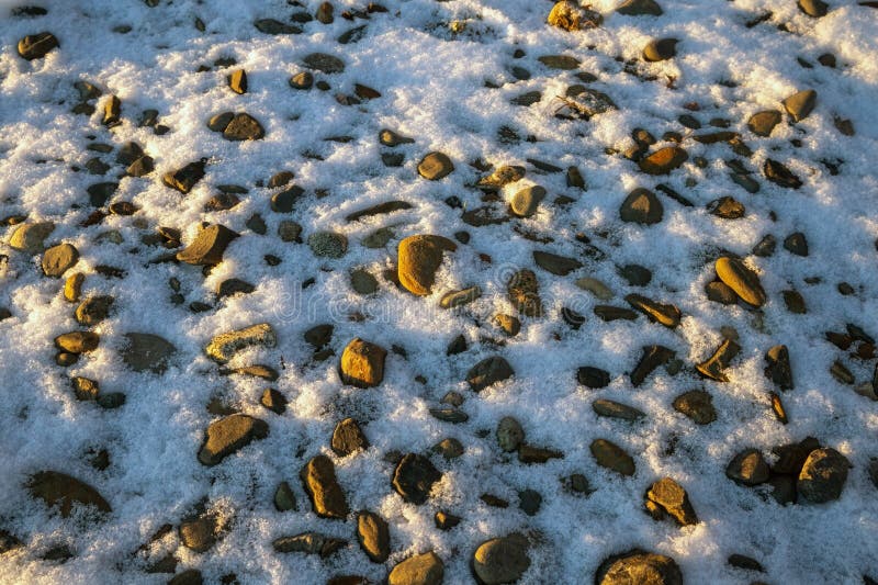 Background of Pebbles and Snow on the Ground Stock Image - Image of ...
