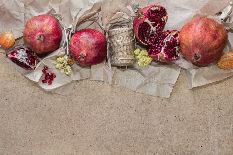 Pomegranate Wrapped in Craft Paper Stock Image - Image of white, retro ...