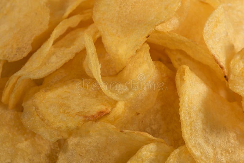 Background of potato chips stock photo. Image of yellow - 36735340