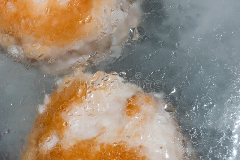 Background with Ready-made Chicken Cutlets through the Glass Stock ...