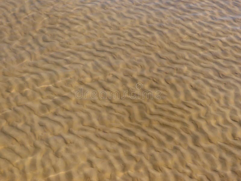 Background of River Sand through a Layer of River Water on the Banks ...