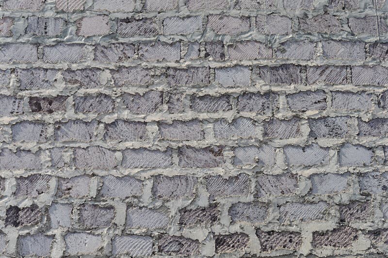 Wall of rough stone bricks stock photo. Image of grey - 102404812
