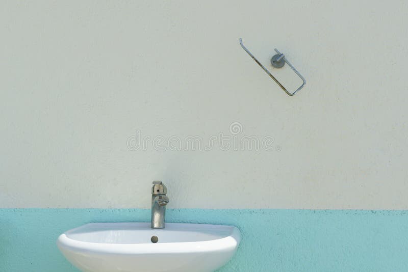 Wall with Old Rough Plaster and a Toilet Door Behind it in the Shadows ...