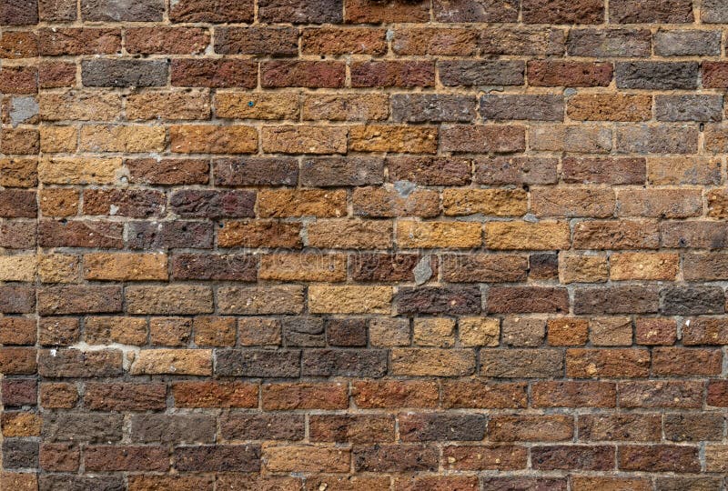 Background of Rough Texture Brick in Shades of Brown, Tan, and Gray ...