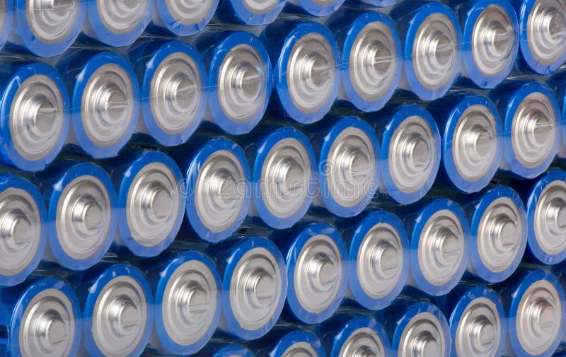 Background from Rows of Blue Batteries Stock Image - Image of equipment ...