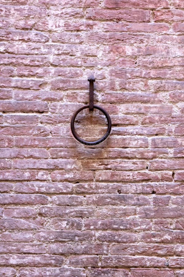 Rusty ring on a brick wall stock image. Image of bricks - 125185243