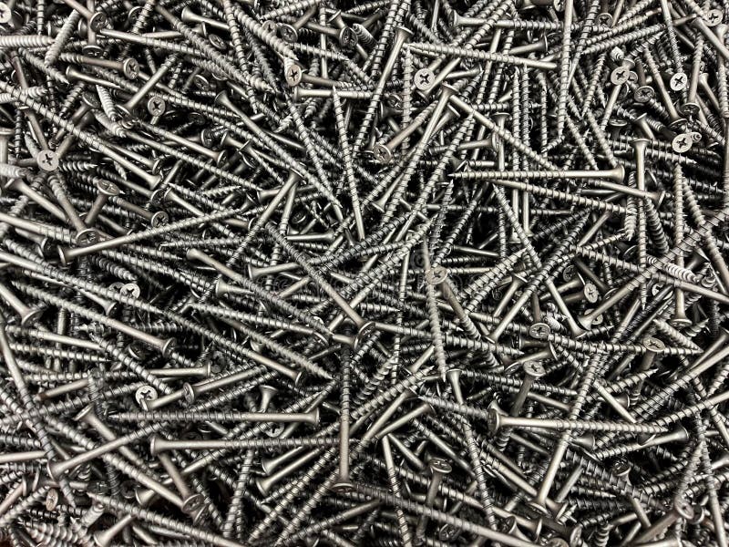 Background of Self-tapping Screws in Close-up. Texture of Self-tapping ...