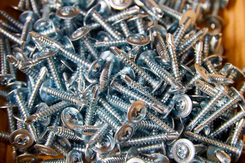 Background of a Set of Galvanized Self-tapping Screws Stock Photo ...