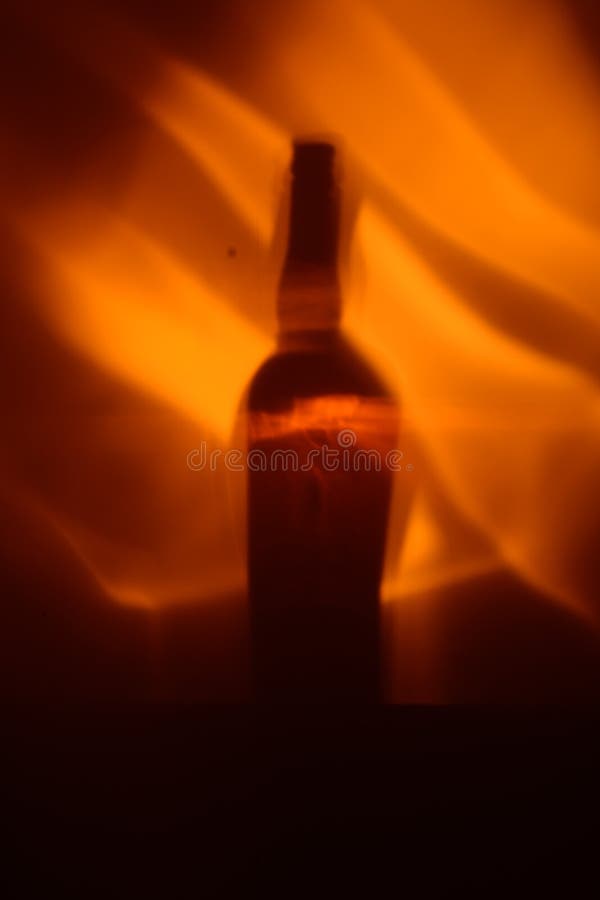 Background. the Shadow of the Bottle of Vine and the Reflection of Fire ...