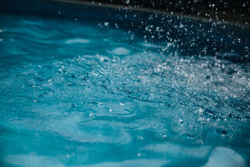 Background Shot of Aqua Sea or Pool Water Surface. Water Drops in the ...