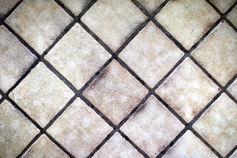 Background of Small Square Tan Floor Tiles in a Diagonal Pattern Stock ...