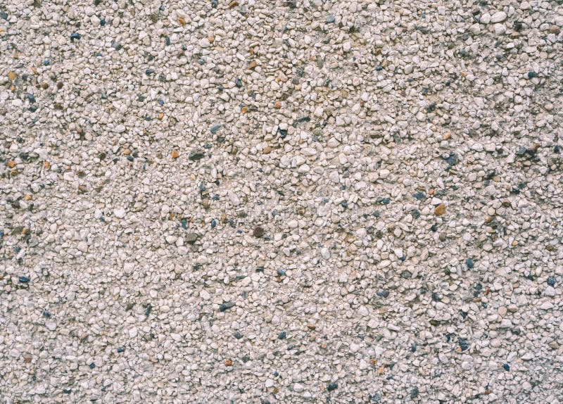 A Background of Small Stones Textured Wall Stock Image - Image of stone ...
