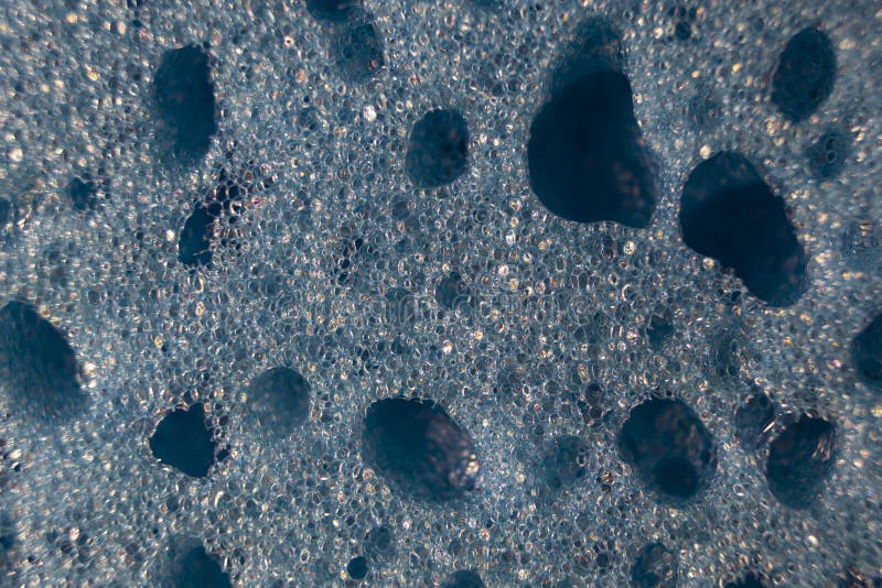 Background of Sponge in Blue Color Shot in Studio. Blue Sponge with ...