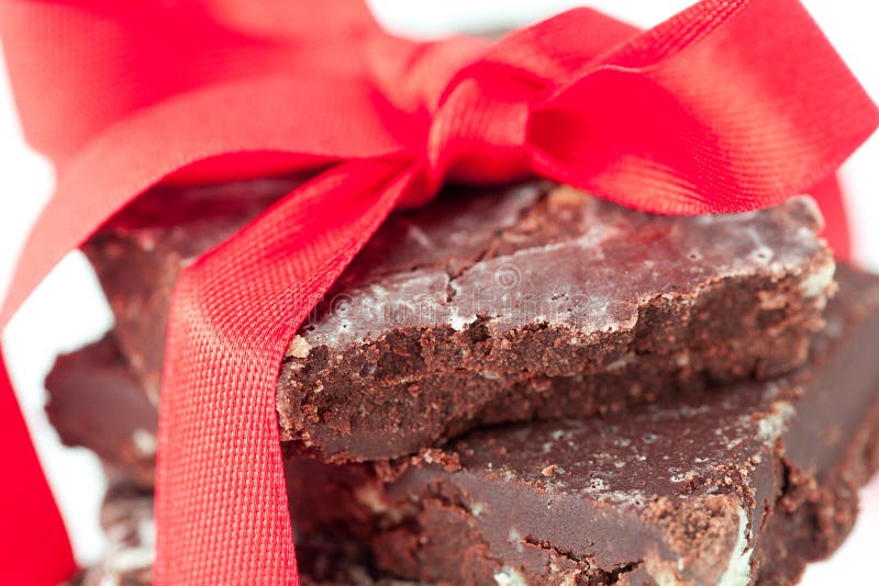 Stack of Chocolate with Red Ribbon and Nuts Stock Photo - Image of ...