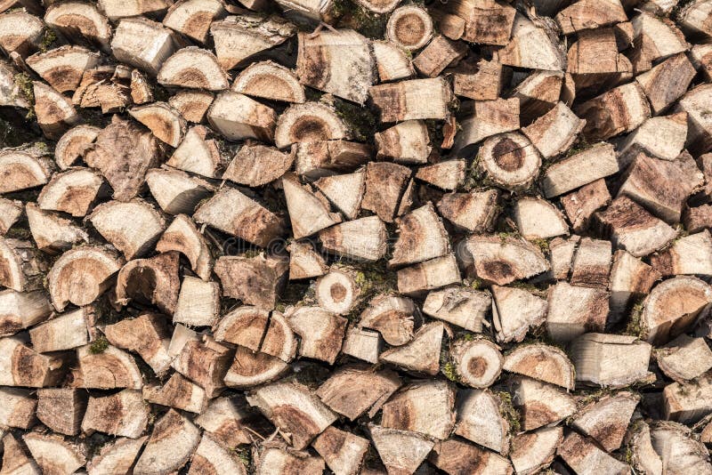 The Background of Stacked, Dry Chopped Logs Used for Firewood Stock ...