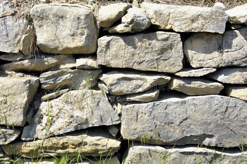 Background of Stacked and Uncemented Stone Wall Stock Image - Image of ...