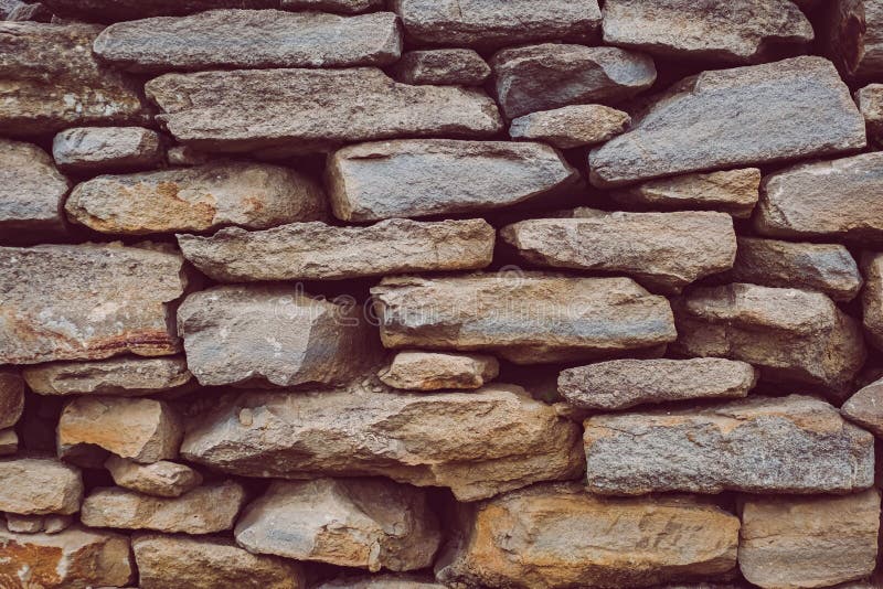 Background of a Stone Wall Closeup. Texture of Large and Small Multi ...