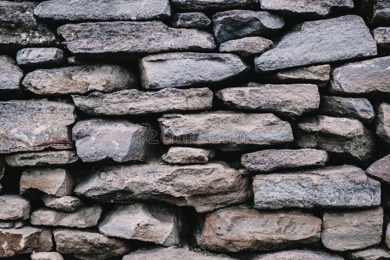 Background of a Stone Wall Closeup. Texture of Large and Small Multi ...