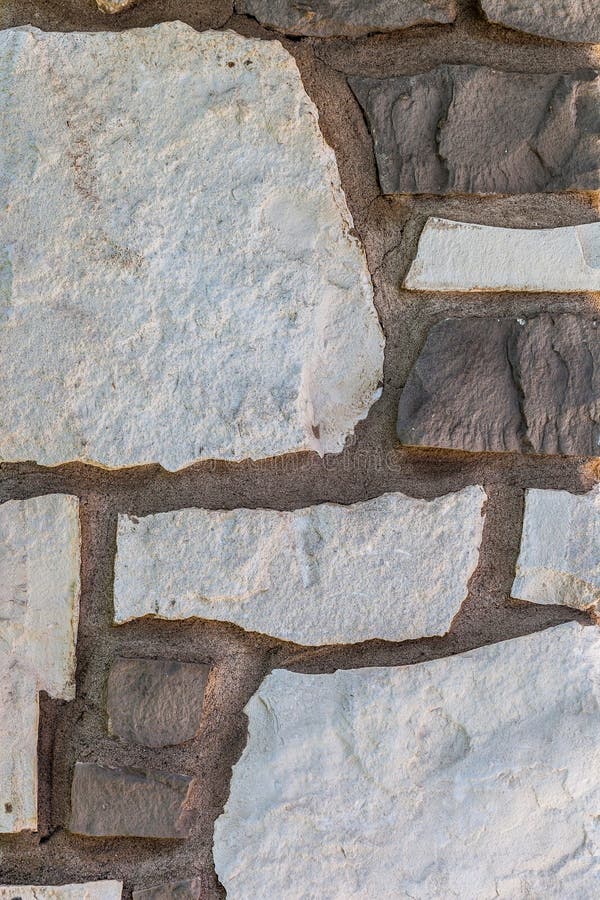 Background with Stone Wall with Irregular Sized White and Brown Slates ...