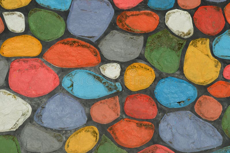 The Background of a Stone Wall that is Painted Colorfully in Each Stone ...