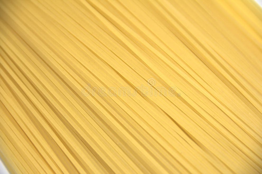 Background with Straight Yellow Spaghetti. Top View. Stock Photo ...