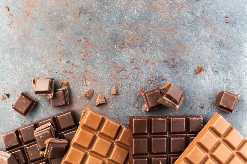 Milk and Dark Chocolate Bars on a Grey Table. Stock Image - Image of ...