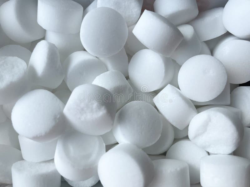 Background of Tableted Salt for Softening Water Close-up Stock Image ...