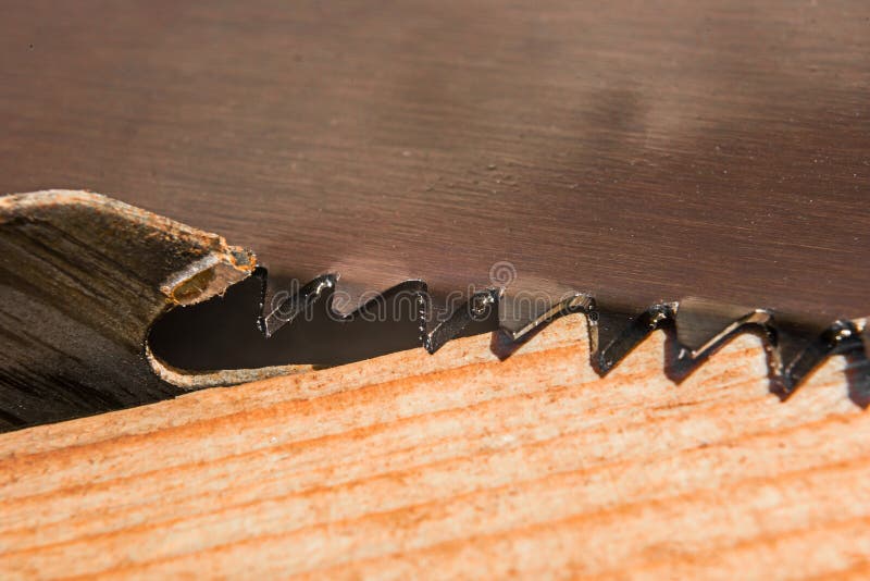 Background of the Teeth of Two Different Saws and Boards Macro Stock ...