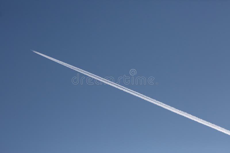 Trace of an airliner. stock photo. Image of travel, clouds - 189649614