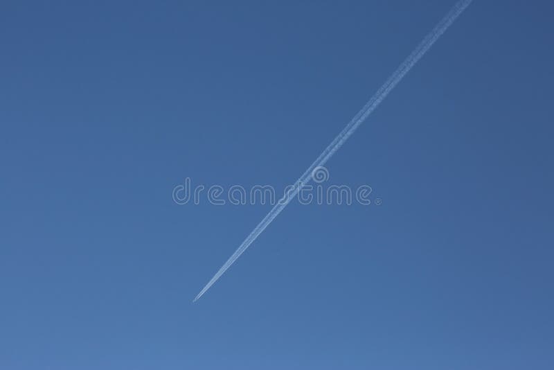 Trace of an airliner. stock photo. Image of motion, plane - 189649622
