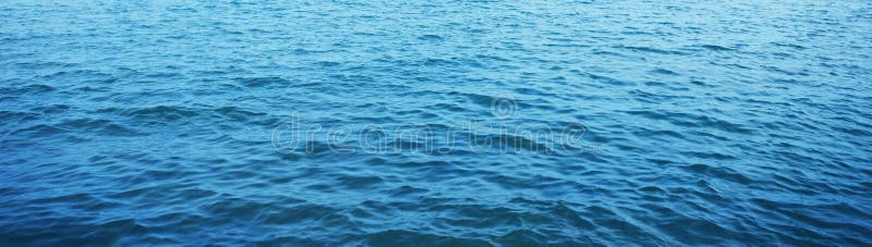 Calm Deep Blue Sea with Ripples on the Surface of the Water. Dark Blue ...
