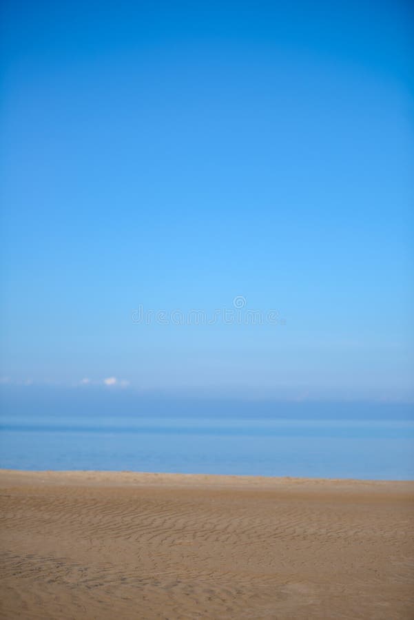The Background Texture Desert Beach. a Cloudless Sky and Sand Stock ...