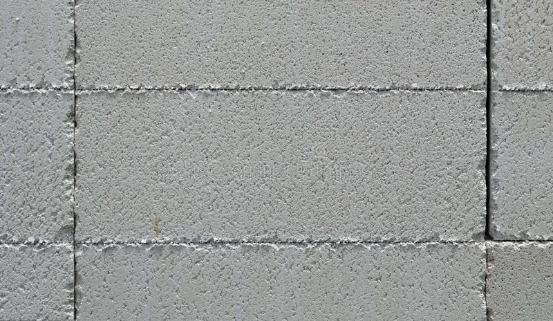 A Background and Texture of Gray Concrete Wall with a Line of Square ...