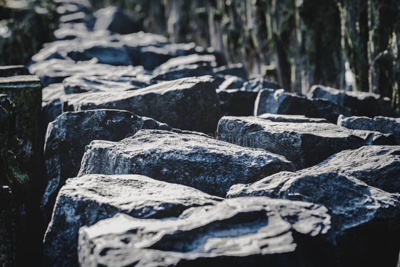 Close Up of Large Solid Gray Basalt Blocks in the Sunlight Along the ...