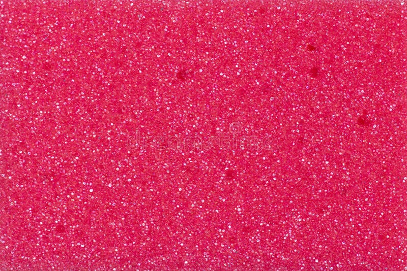 Background Texture of a Pink Sponge with Shiny Particles. Close-up of a ...