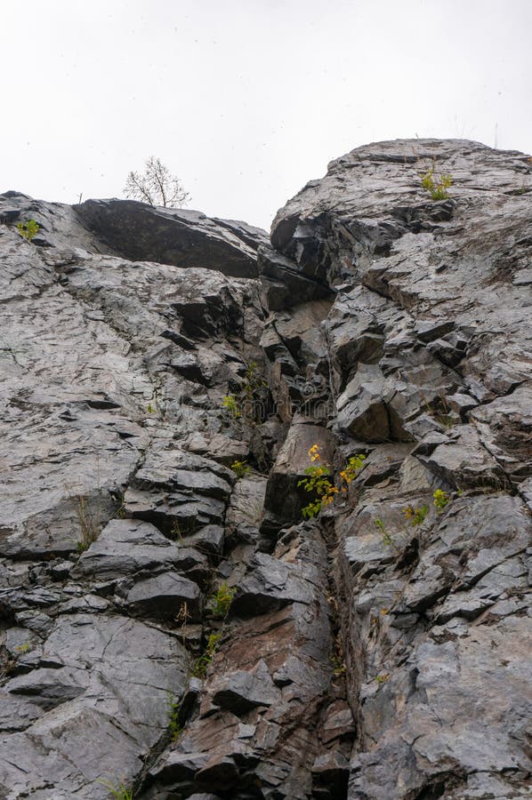 Background, Texture Rough Stones of a Stone Cliff Stock Image - Image ...