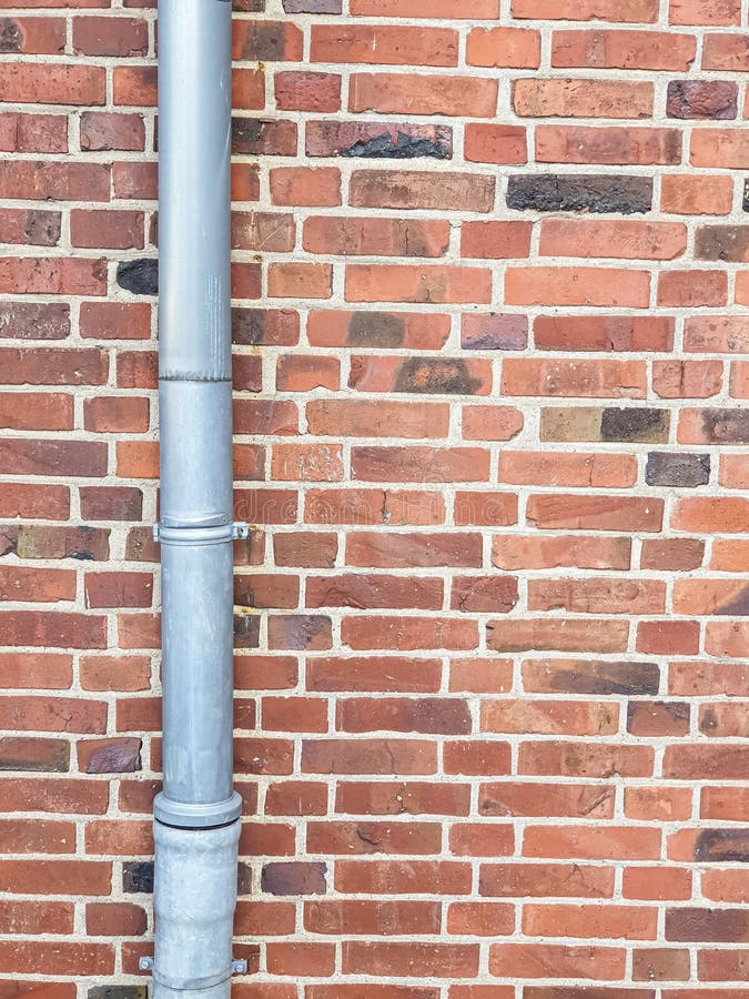 Background Texture Stone Wall of Bricks and a Gutter Stock Image ...