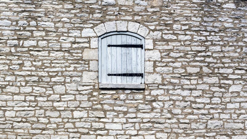 Background Texture of a Stone Wall with a Wooden Shuttered Window Stock ...