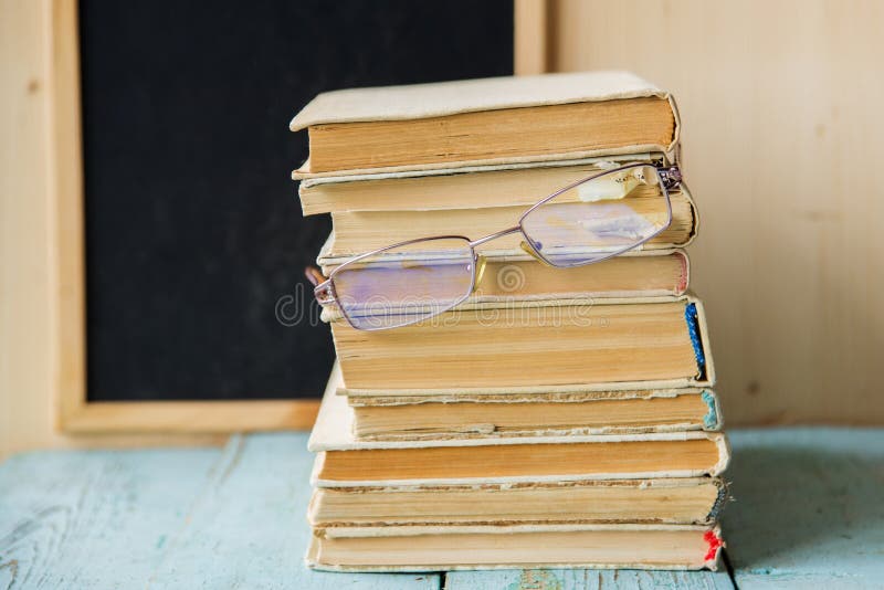 Stack of Books with Apple and Glasses Stock Photo - Image of color ...