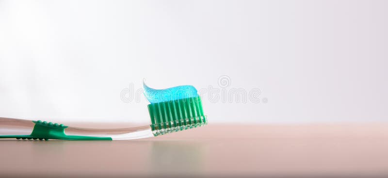 Background with Toothbrush with Toothpaste on Wooden Table Front Stock ...