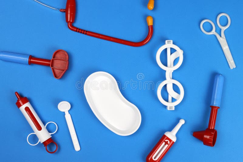 Background of Toy Medical Doctor Tools on Blue Background Stock Image ...