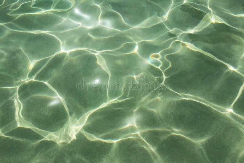 Background of Transparent Pure Sea Water with Sparkling Sun Rays ...