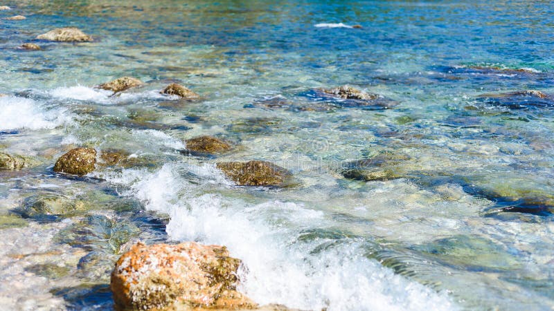 Background of Transparent Sea Water and Bottom, with Stones and Waves ...