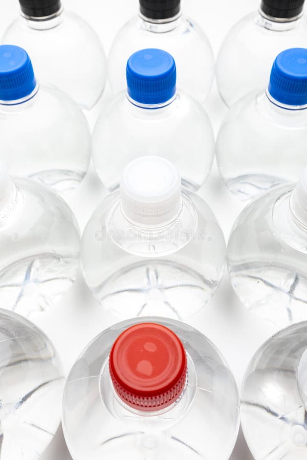 Background of Transparent Spherical Water Bottles with Colored Caps ...
