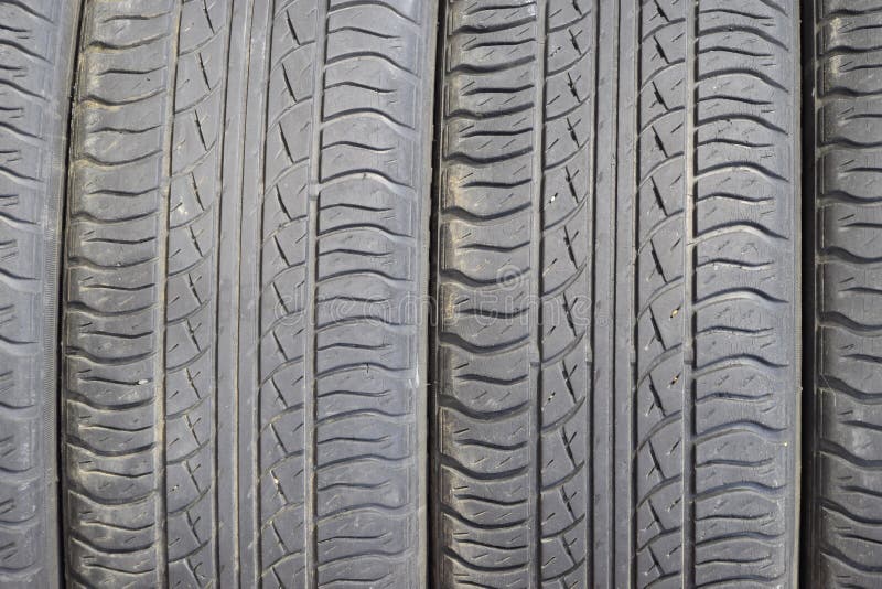 The Background of the Tread Pattern of the Car Wheel. Rubber Tir Stock ...