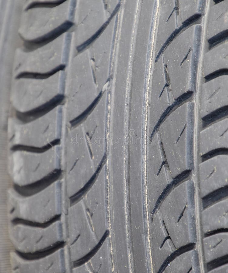 The Background of the Tread Pattern of the Car Wheel. Rubber Tir Stock ...