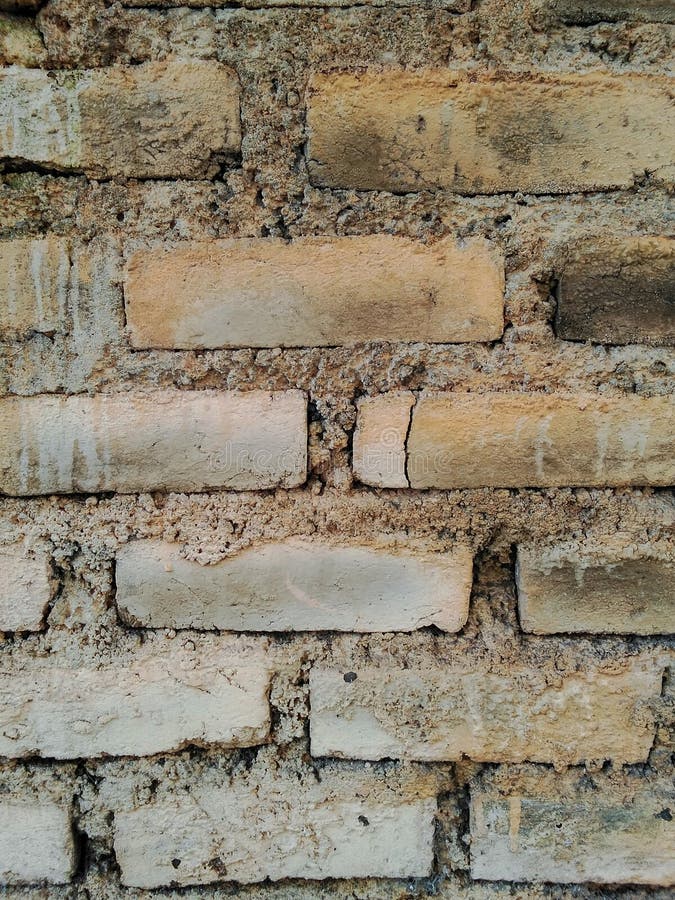 The Background of an Unfinished Wall, the Bricks and Cement are Still ...