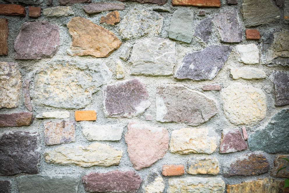 Background of Unshaped Stone or Rock Wall Stock Image - Image of cement ...